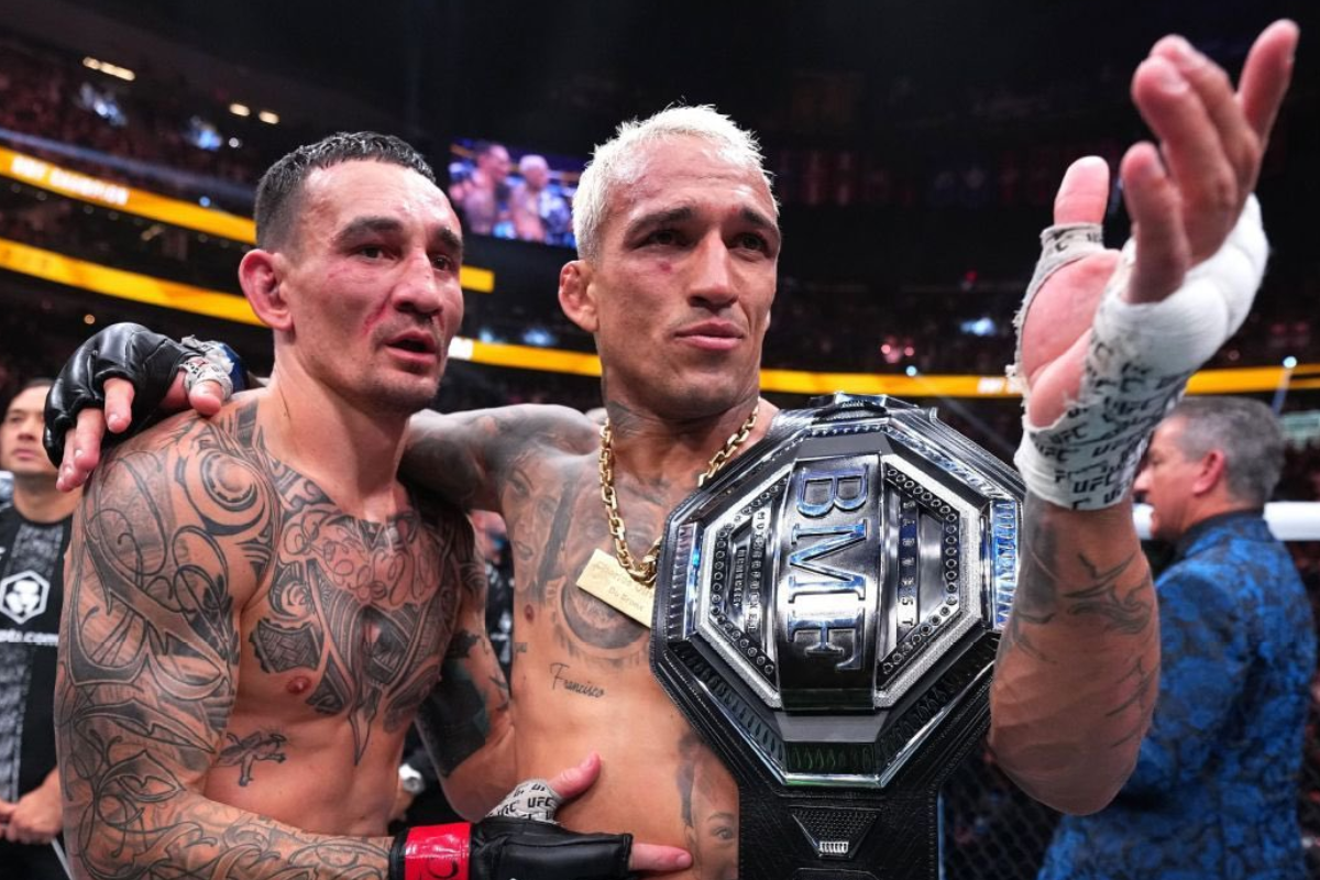 After losing to Charles Oliveira at UFC 326, Max Holloway earns a black ...